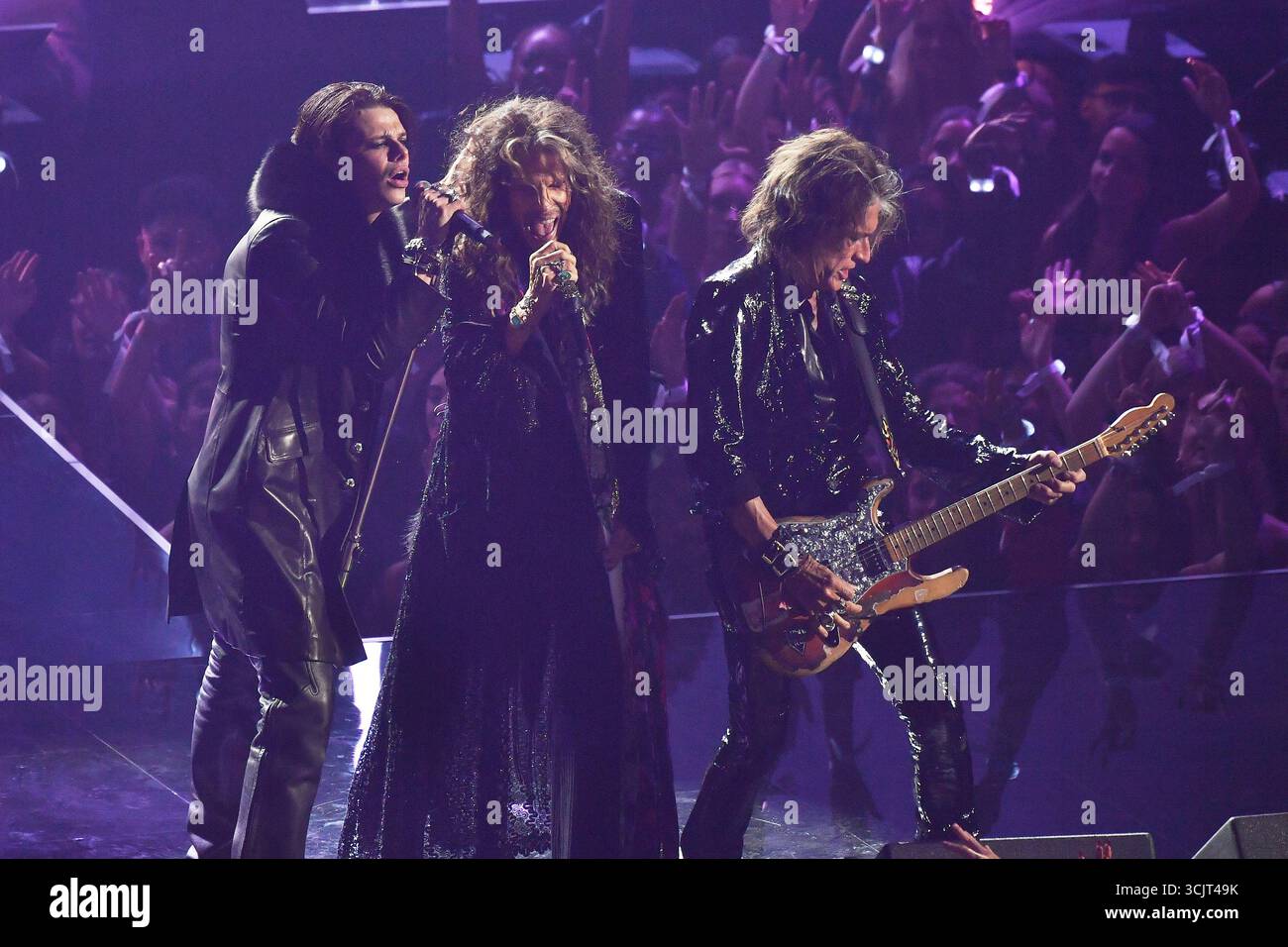 Yungblud, Steven Tyler, and Joe Perry perform Ozzy Osbourne tribute onstage during the 2025 MTV ...