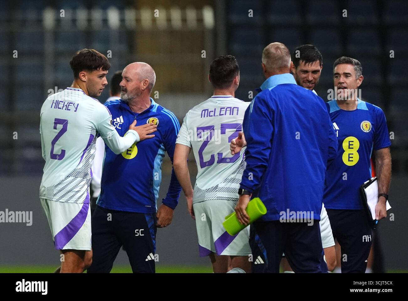 Scotland's Aaron Hickey greets Scotland manager Steve Clarke following ...