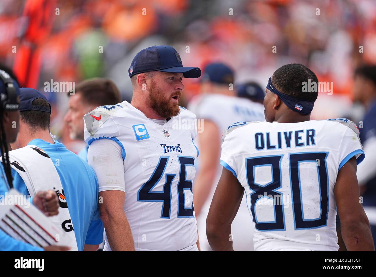 Tennessee Titans long snapper Morgan Cox (46) confers with wide ...