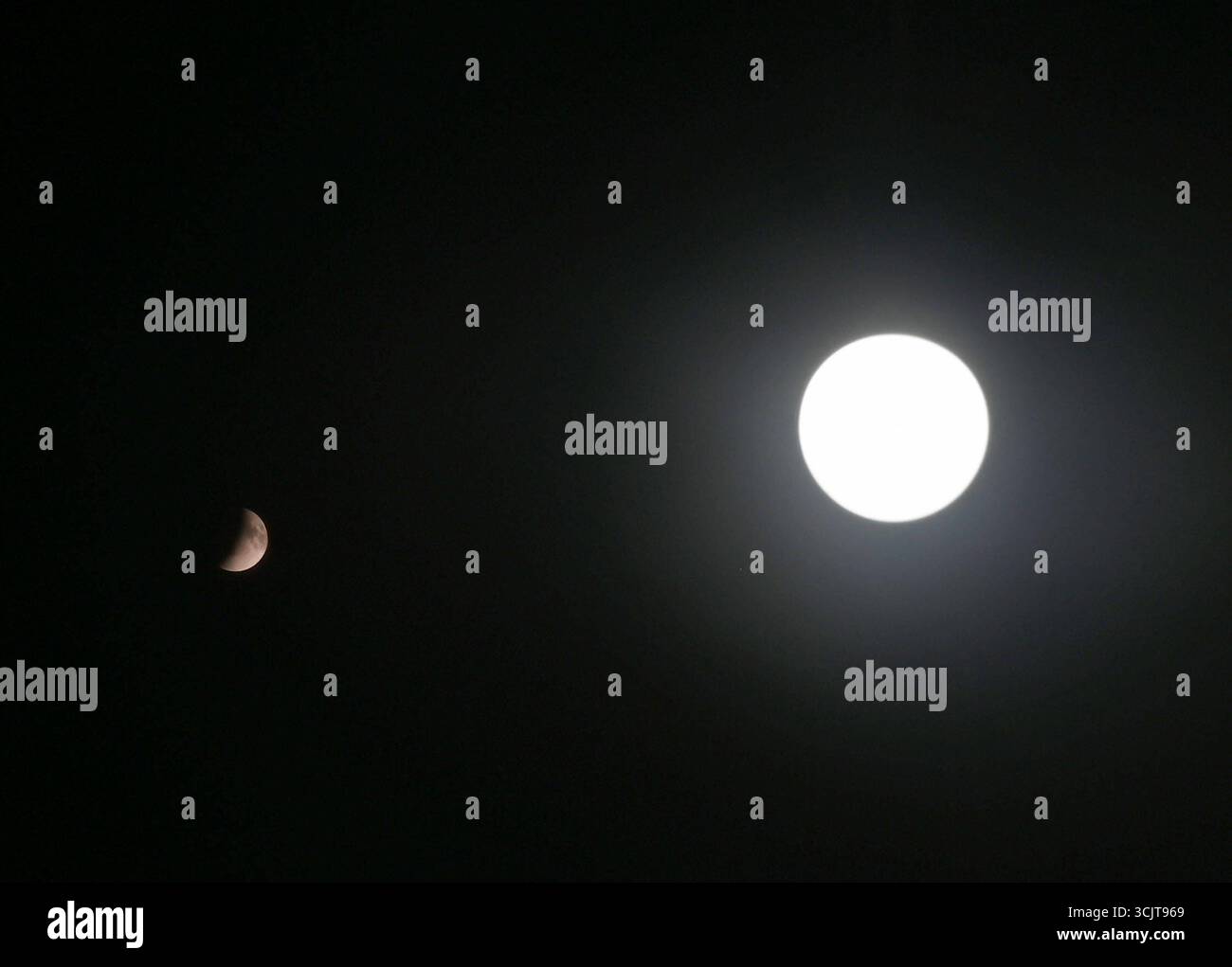 NOIDA, INDIA - SEPTEMBER 7: A view of the moon during partial umbral ...
