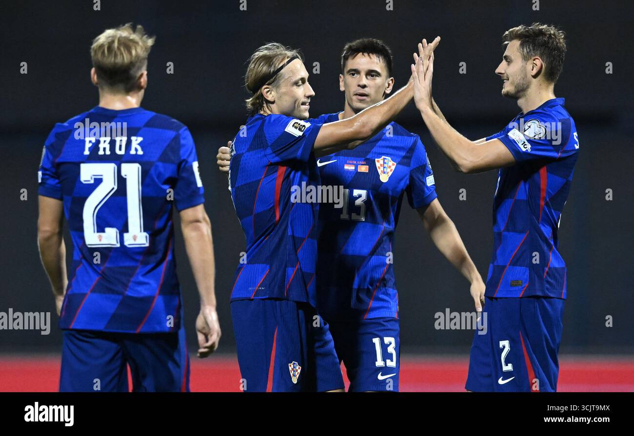 Lovro Majer, Nikola Moro and Josip Stanisic of Croatia during the FIFA ...