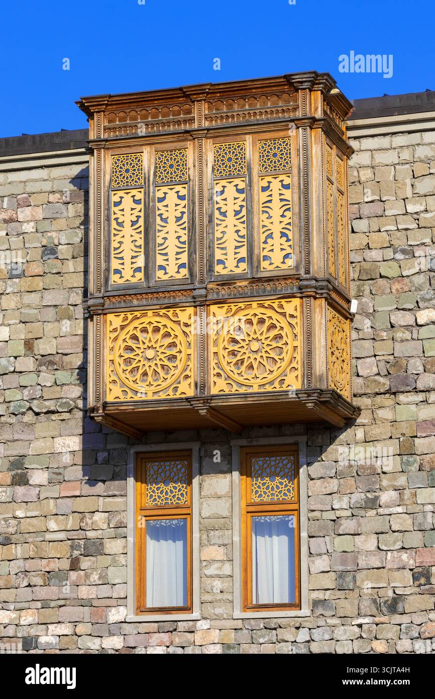 Close-up of an ornate wooden enclosed balcony (aka Maltese balcony or a ...