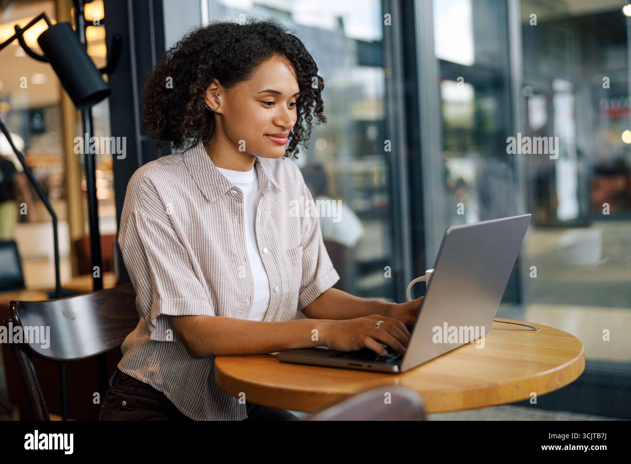 Focused woman freelance writer hi-res stock photography and images - Alamy