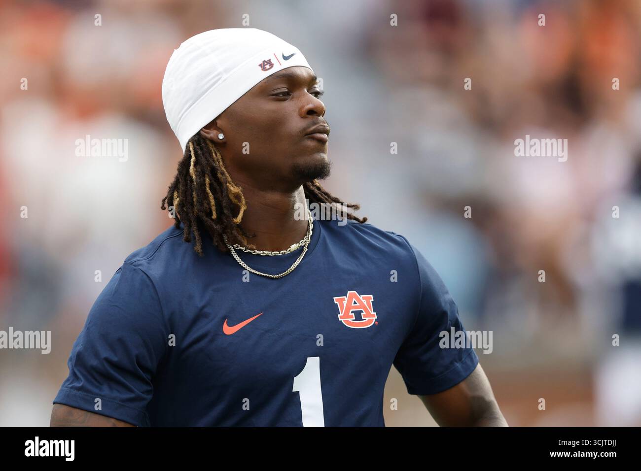 Auburn wide receiver Eric Singleton Jr. warms up before an NCAA college ...
