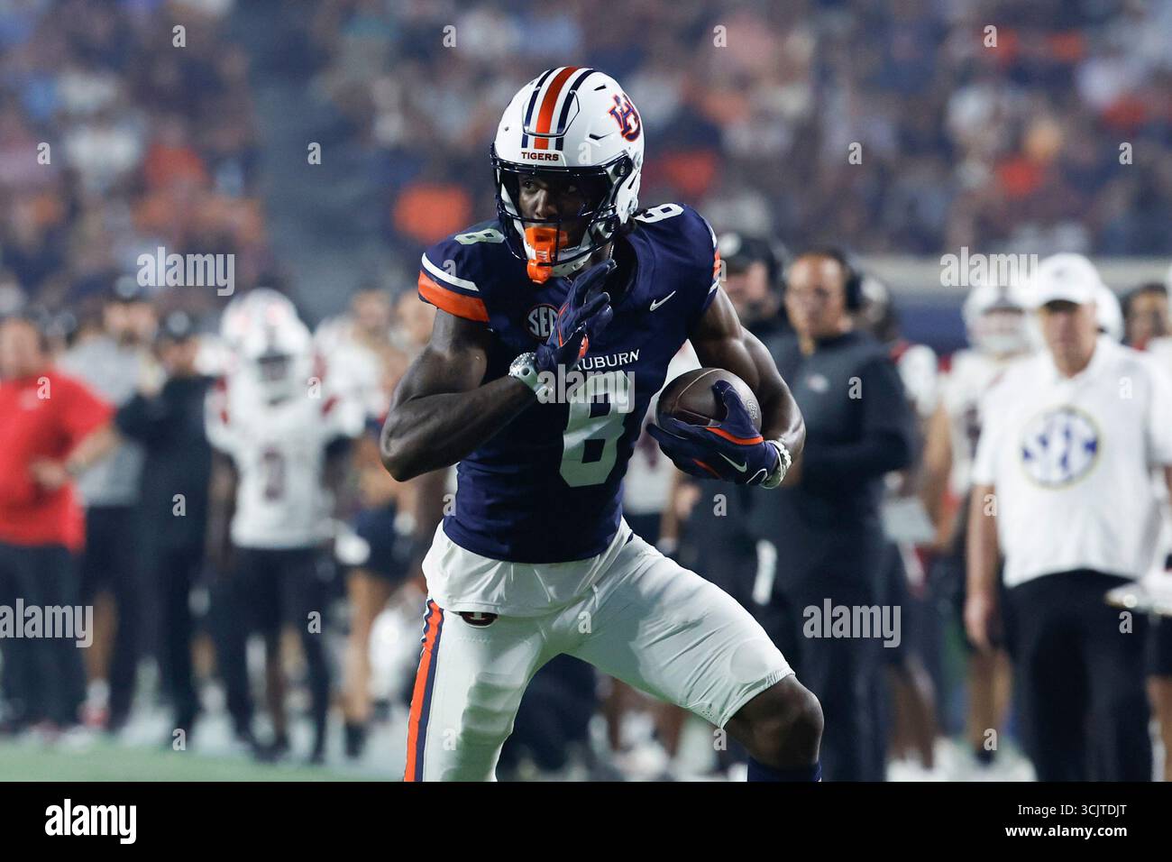 Auburn wide receiver Cam Coleman carries the ball during the second ...