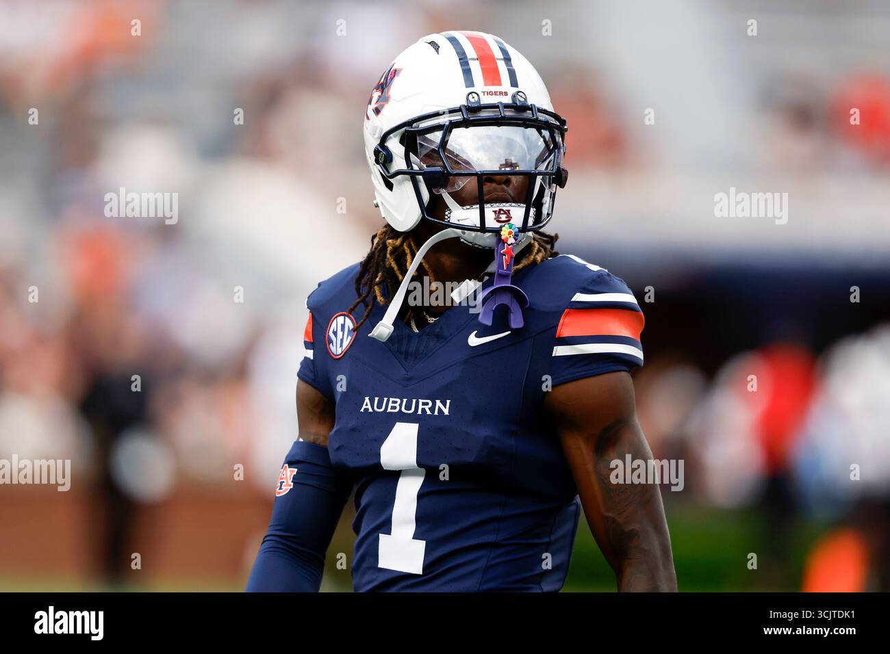 Auburn wide receiver Eric Singleton Jr. warms up before an NCAA college ...