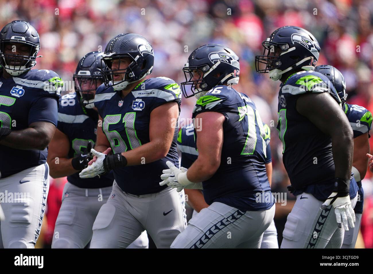 Seattle Seahawks center Jalen Sundell (61) and guard Grey Zabel (76 ...