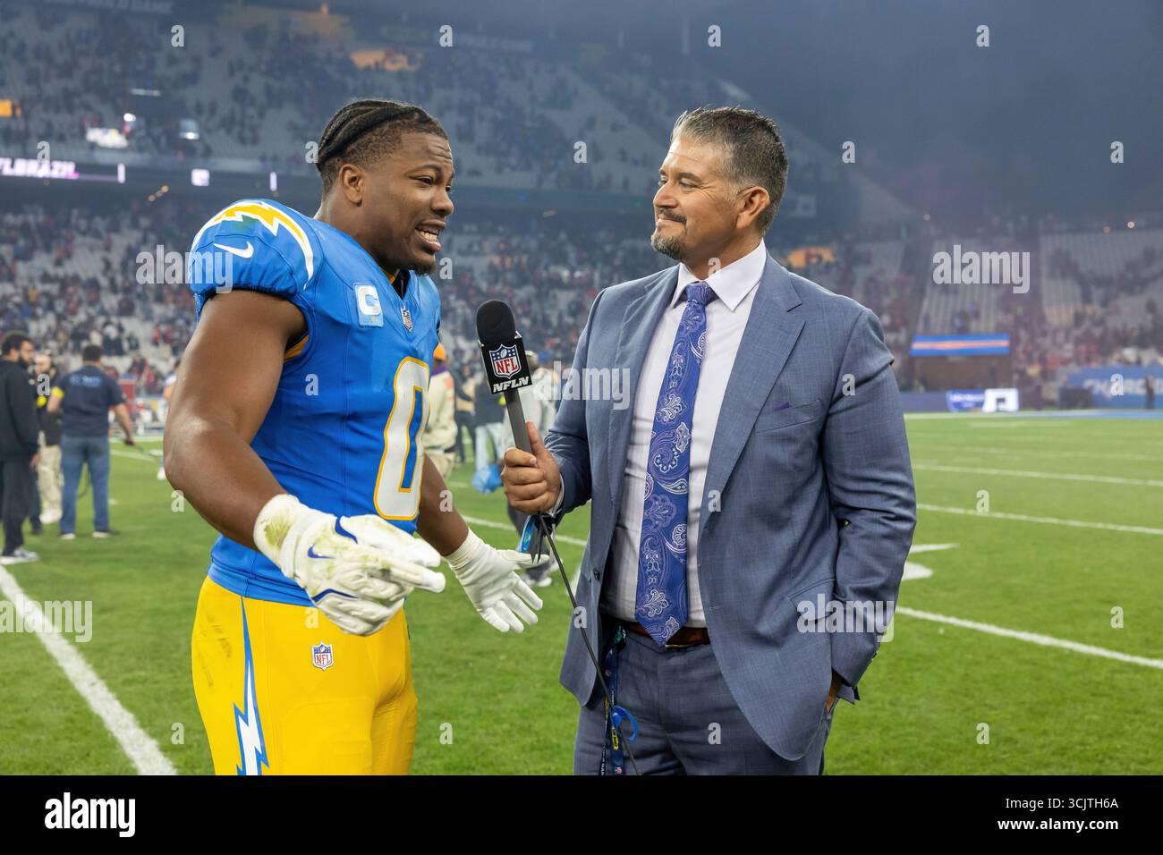 Los Angeles Chargers linebacker Daiyan Henley (0) is interviewed by the ...