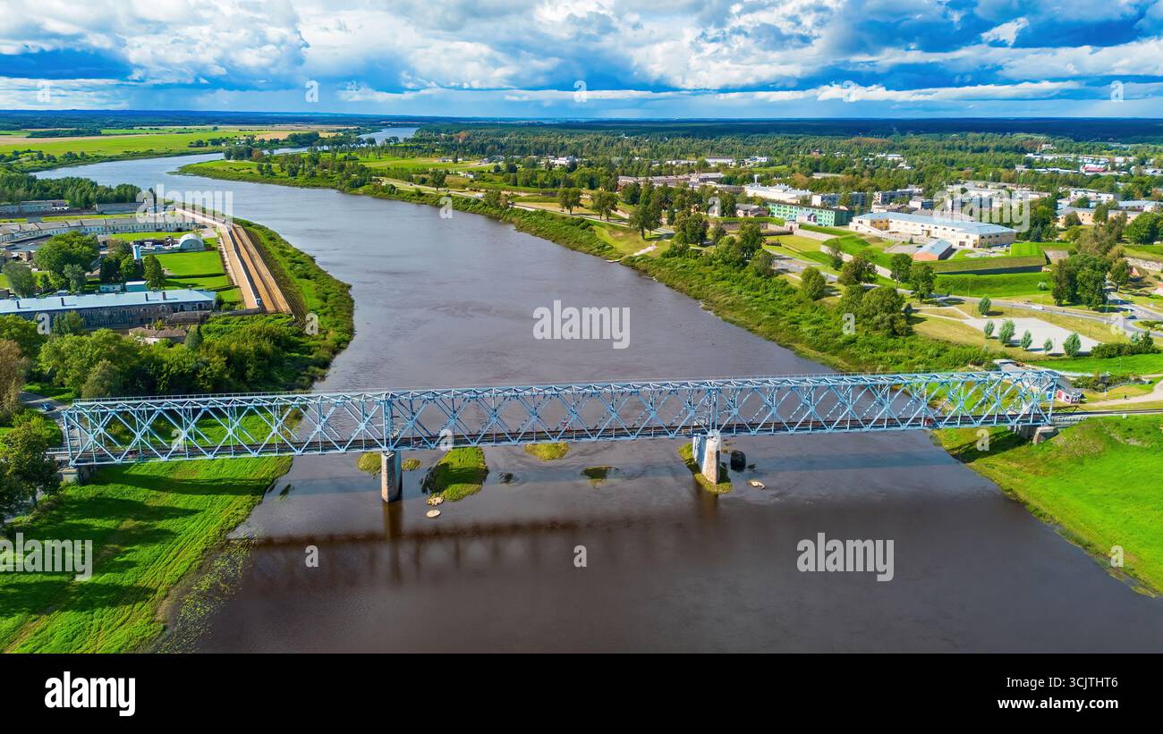 Aerial view of a railway bridge crossing the Daugava River in ...