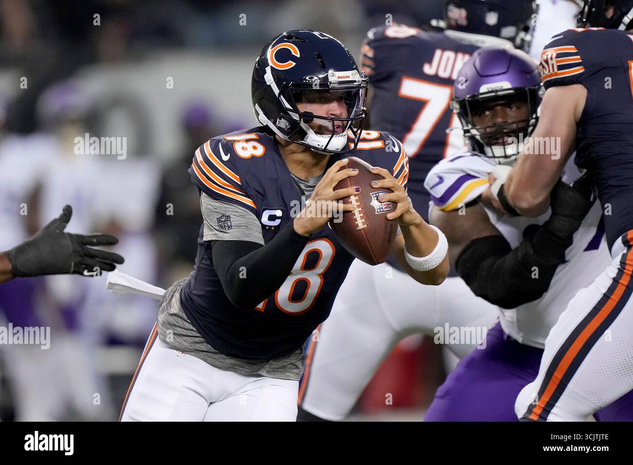 Chicago Bears quarterback Caleb Williams scrambles during the first ...