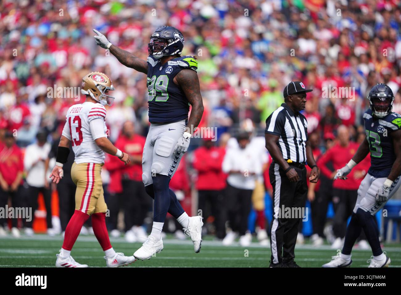 Seattle Seahawks defensive end Leonard Williams (99) reacts during an ...