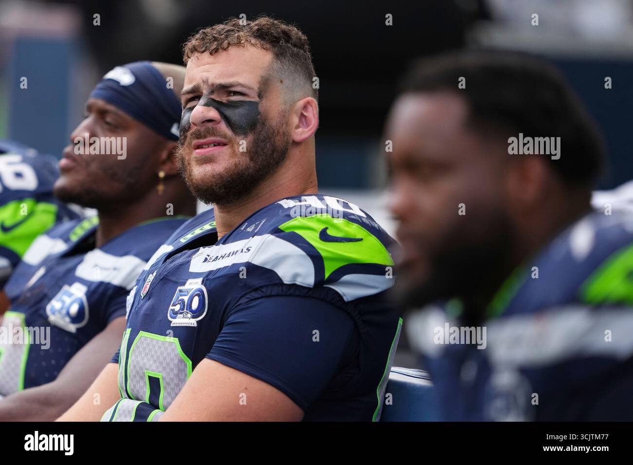 Seattle Seahawks fullback Robbie Ouzts sits on the bench during an NFL ...
