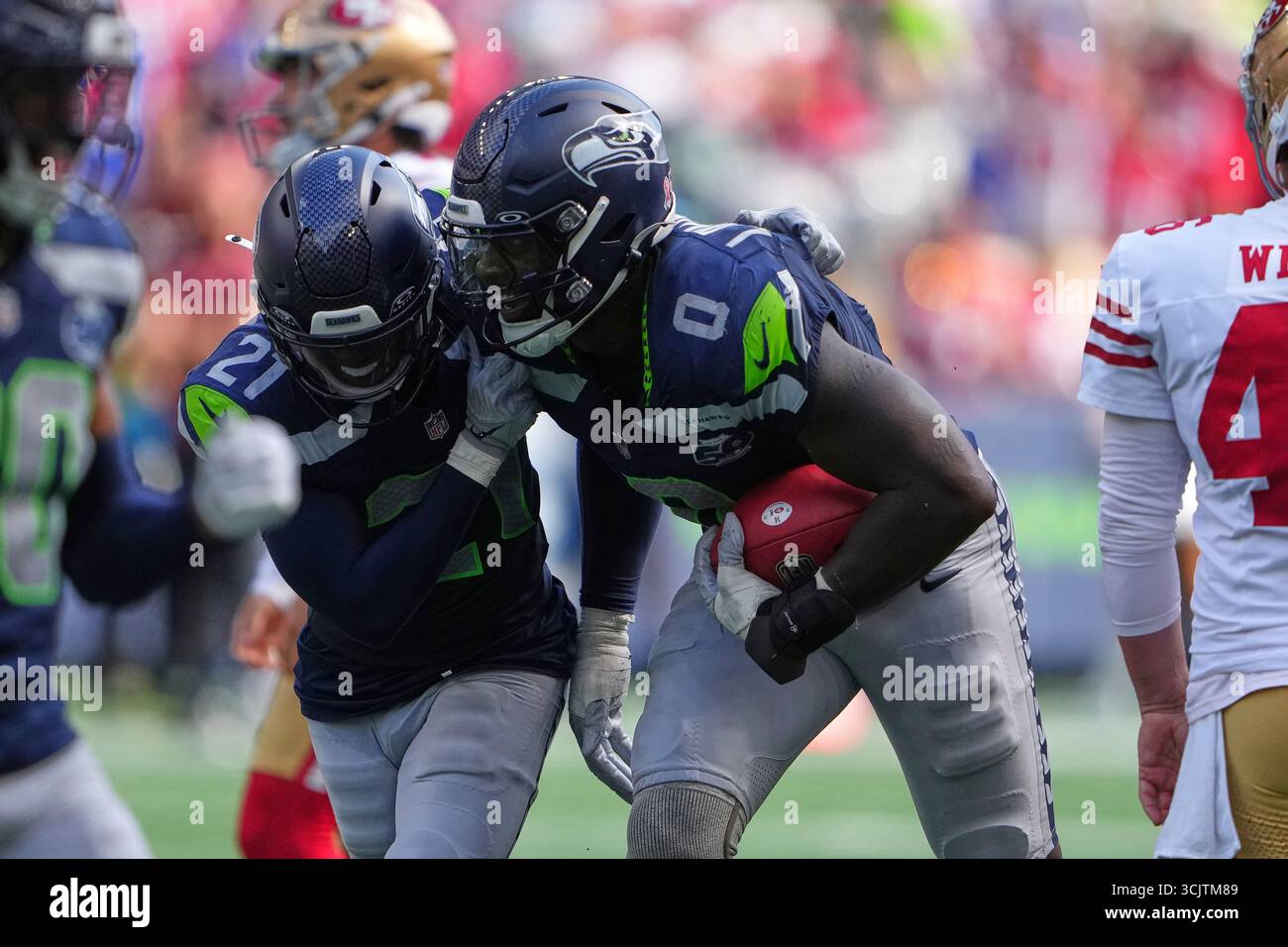 Seattle Seahawks defensive end DeMarcus Lawrence (0) reacts with ...