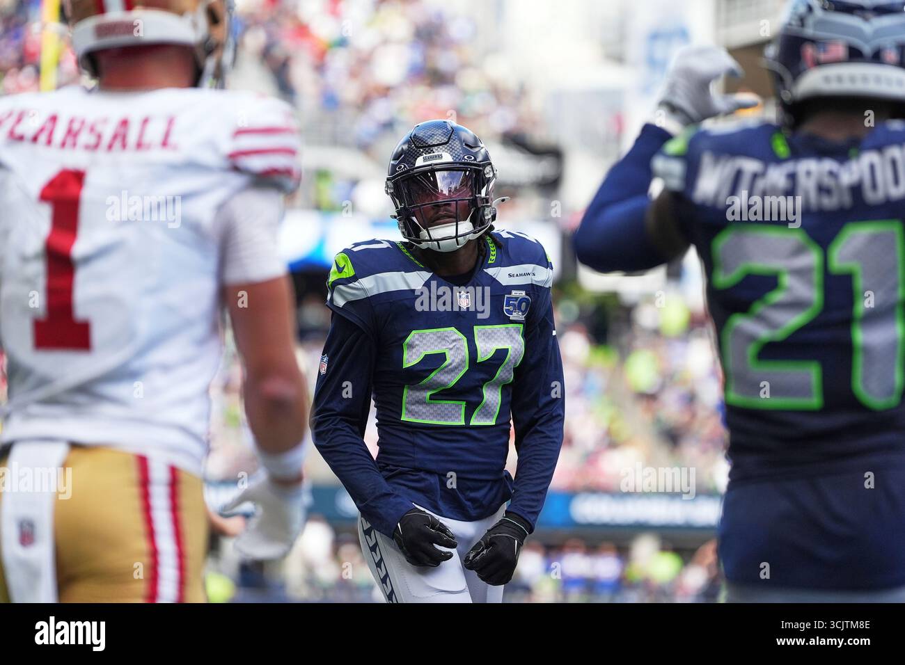 Seattle Seahawks cornerback Riq Woolen (27) reacts with cornerback ...