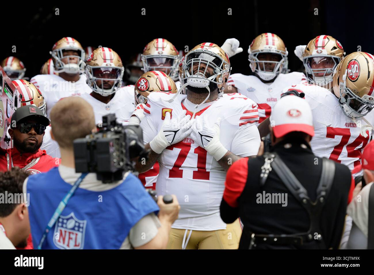 San Francisco 49ers offensive tackle Trent Williams (71) cheers with ...