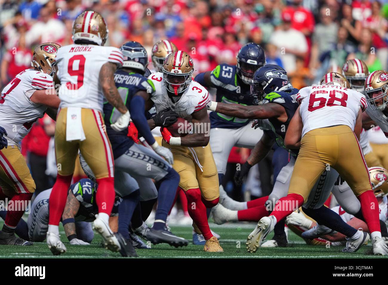 San Francisco 49ers running back Brian Robinson Jr. (3) runs the ball ...