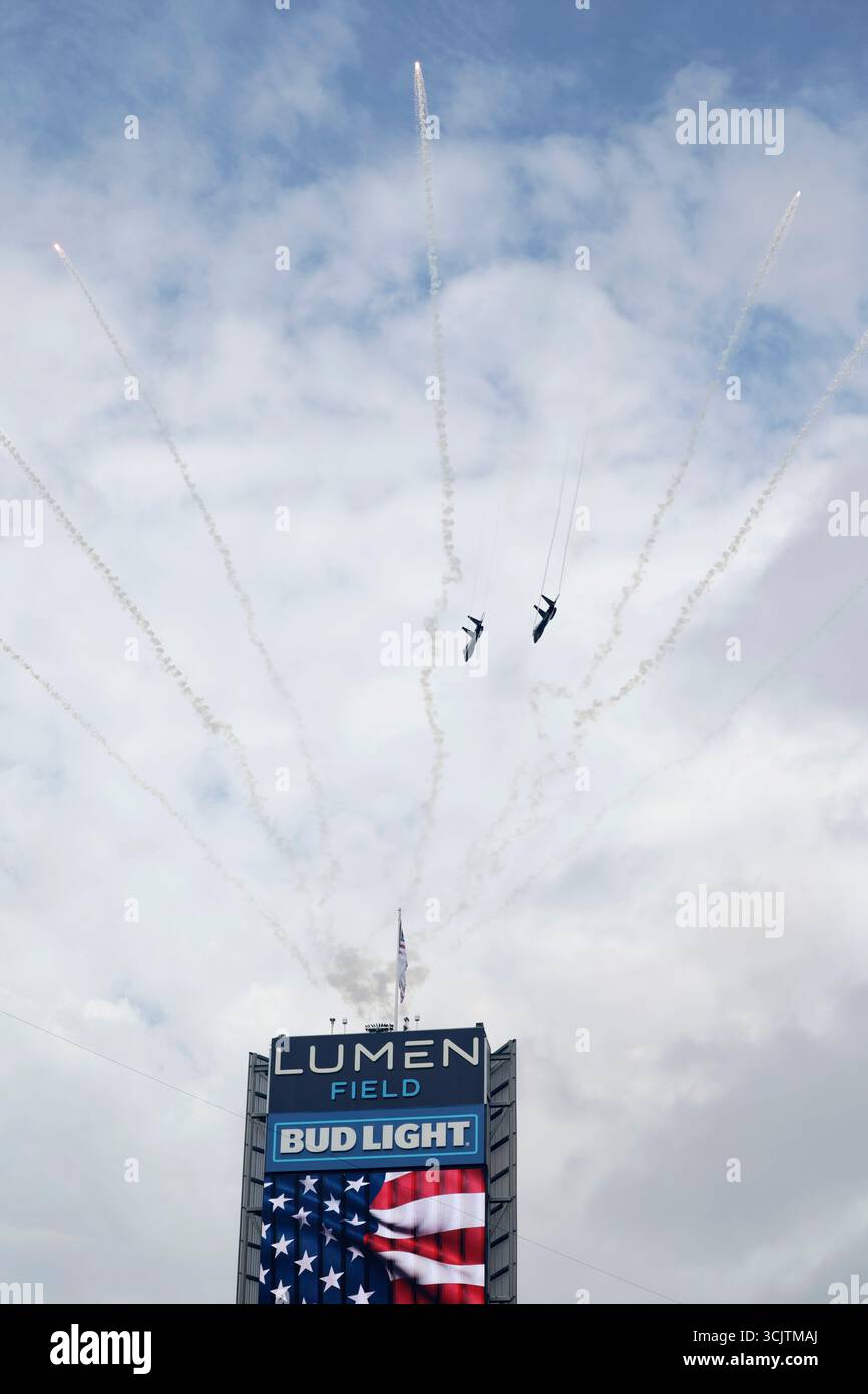Military jets fly over Lumen Field the National Anthem before an NFL ...