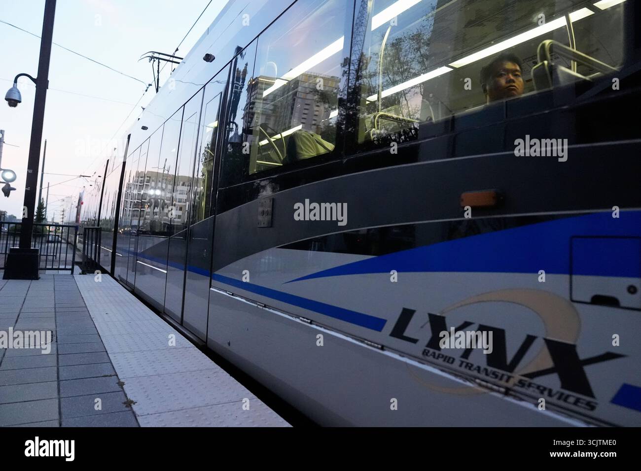 A Charlotte Area Transit System light rail arrives at a station, Monday ...
