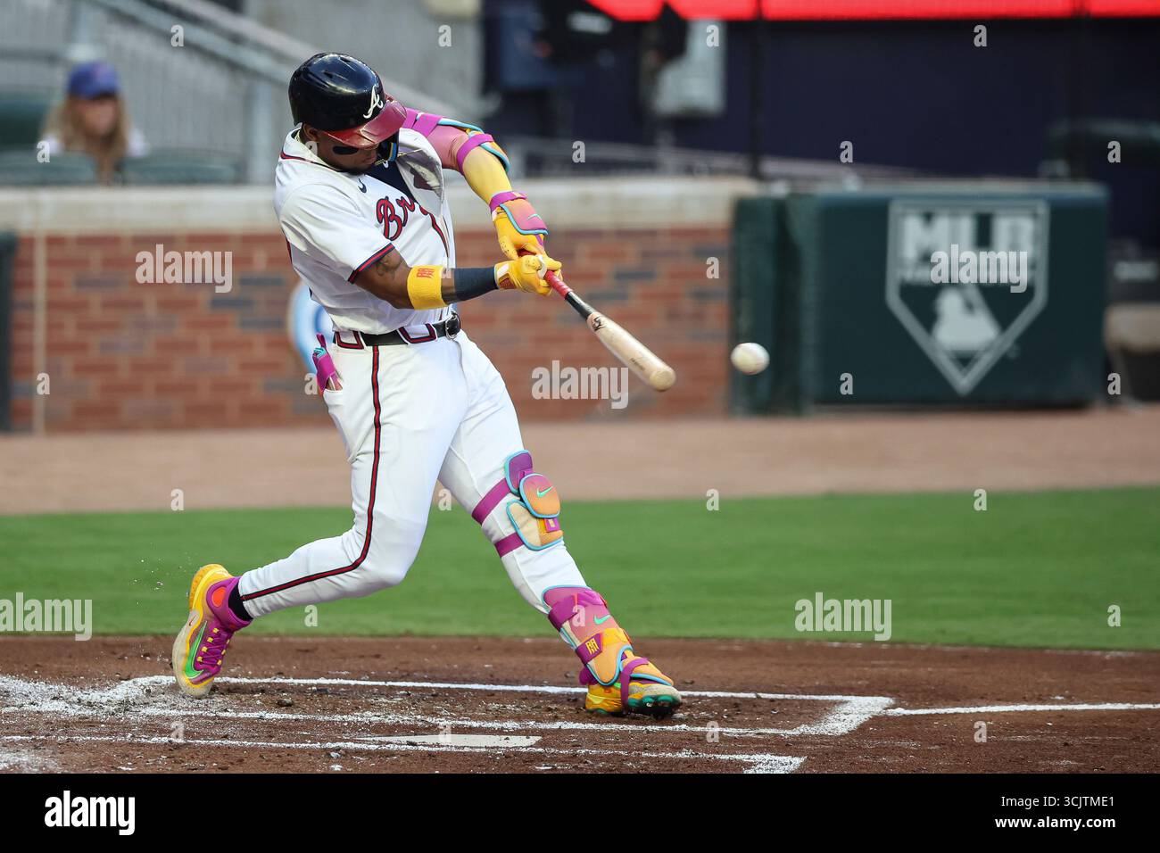 Atlanta Braves' Ronald Acuña Jr. hits an RBI single in the first inning ...
