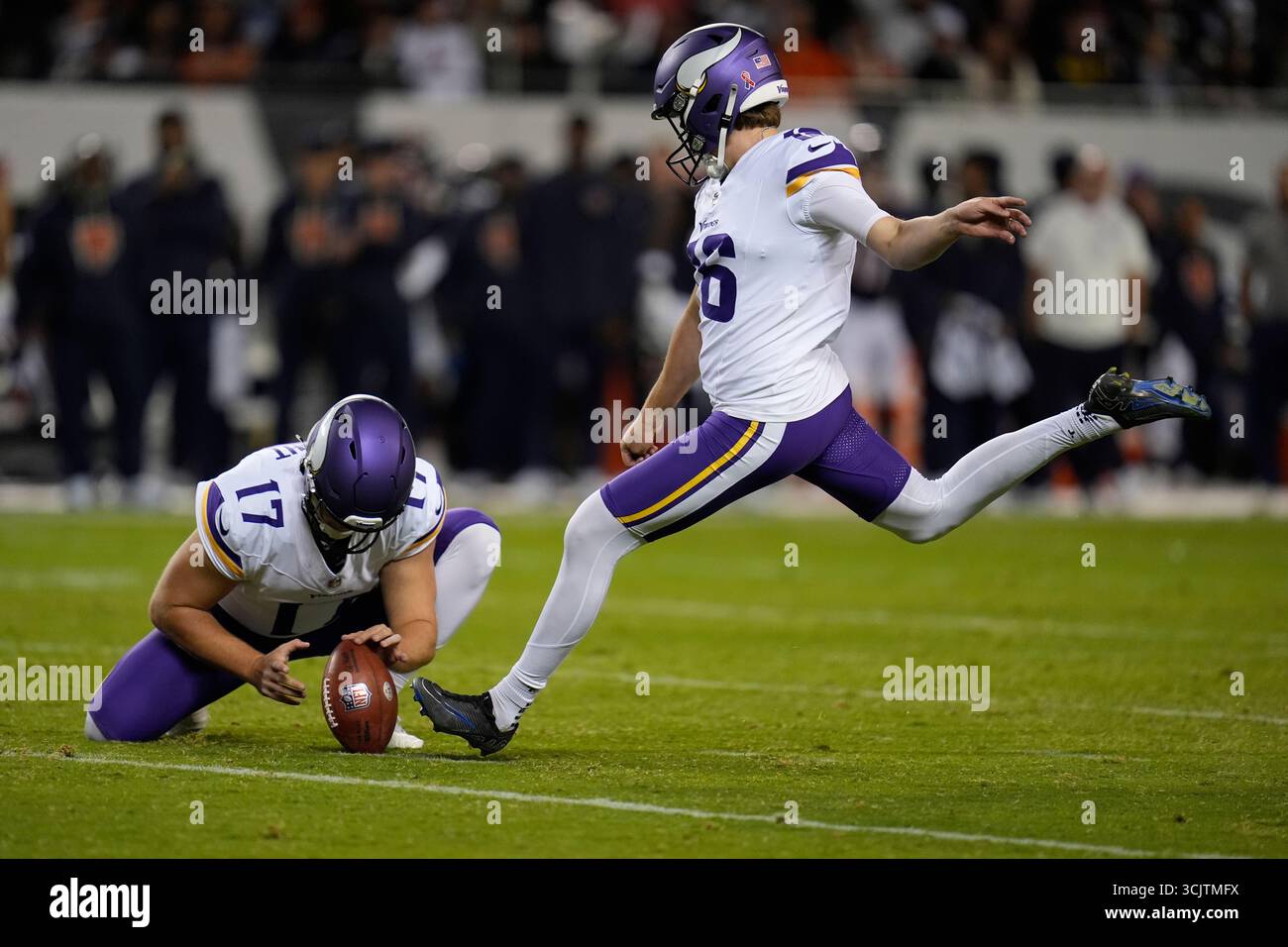 Minnesota Vikings kicker Will Reichard, right, makes a 31-yard field ...