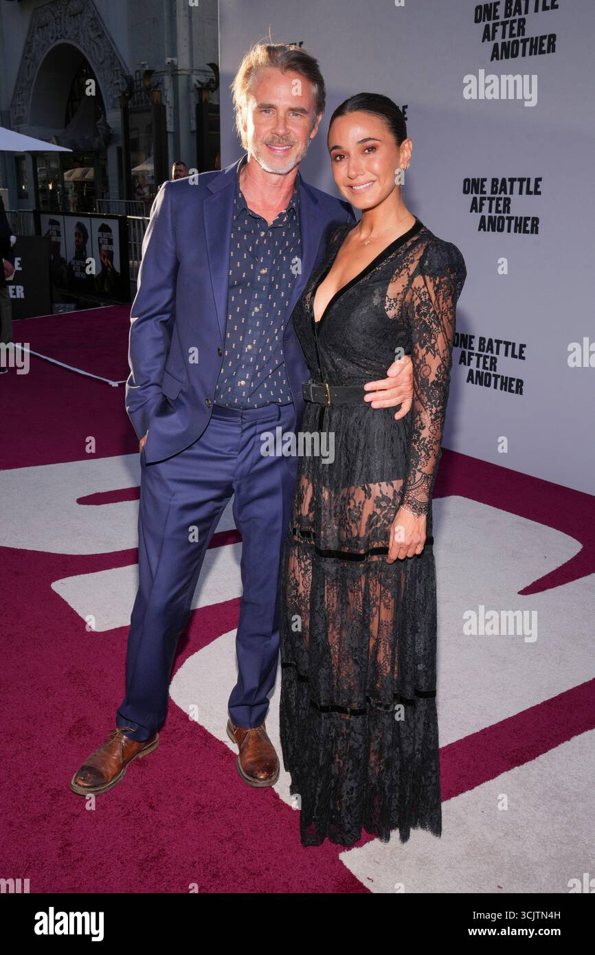 Sam Trammell, left, and Emmanuelle Chriqui arrive at the premiere of "One Battle After Another ...
