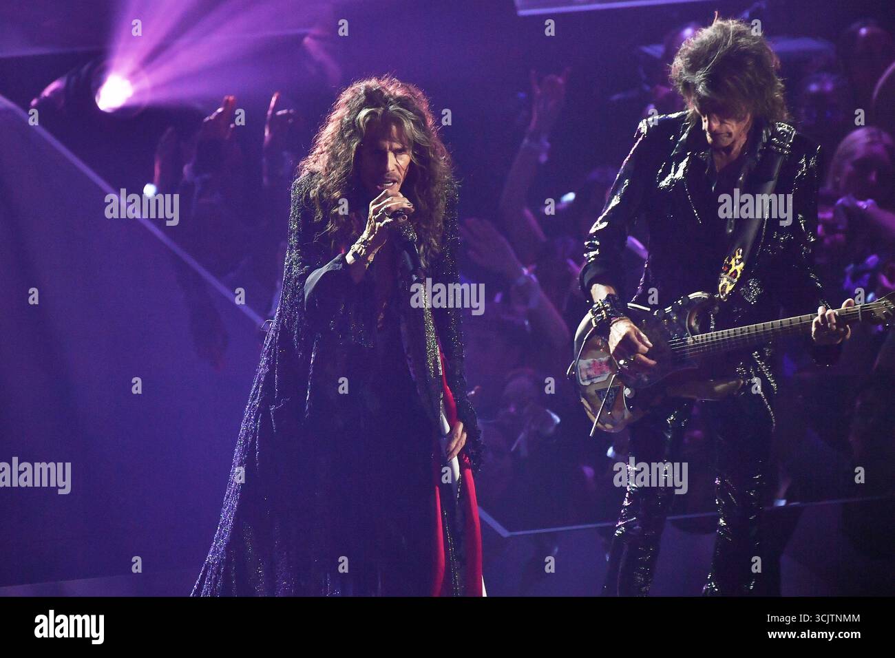 Steven Tyler and Joe Perry perform Ozzy Osbourne tribute onstage during ...