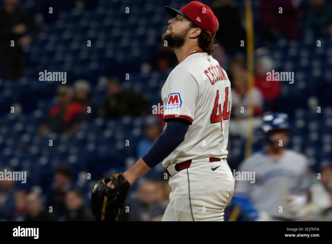 Cleveland Guardians starting pitcher Slade Cecconi reacts after giving ...