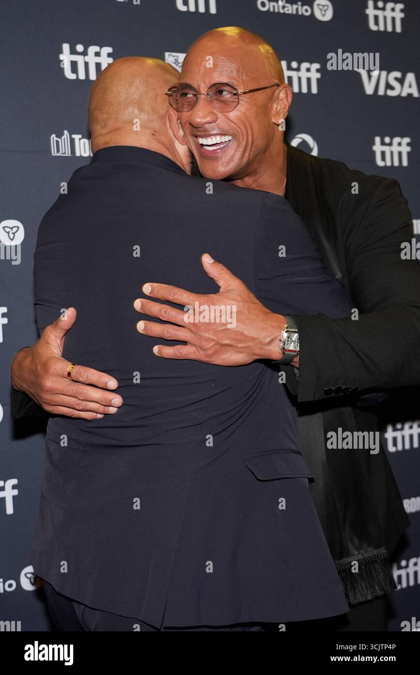 Mark Kerr, left, and Dwayne Johnson attend the premiere of "The ...