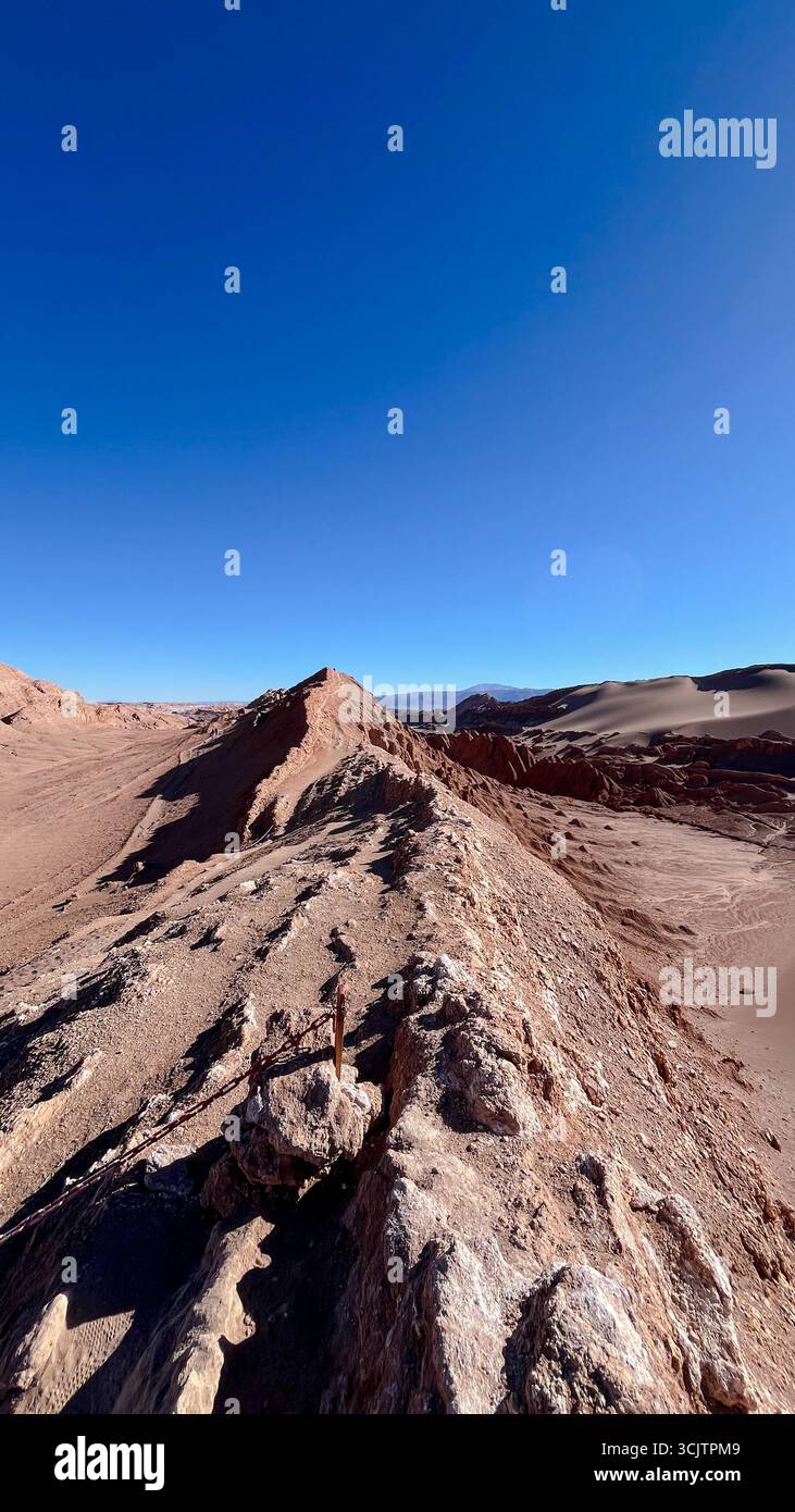 Vertical photo of Valle de la Luna or English Valley of the Moon in ...