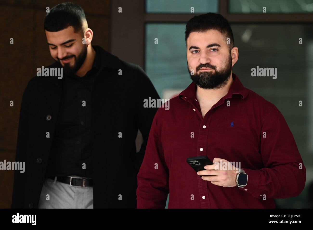 Burgertory owner Hasheam "Hash" Tayeh (right) departs the Melbourne ...
