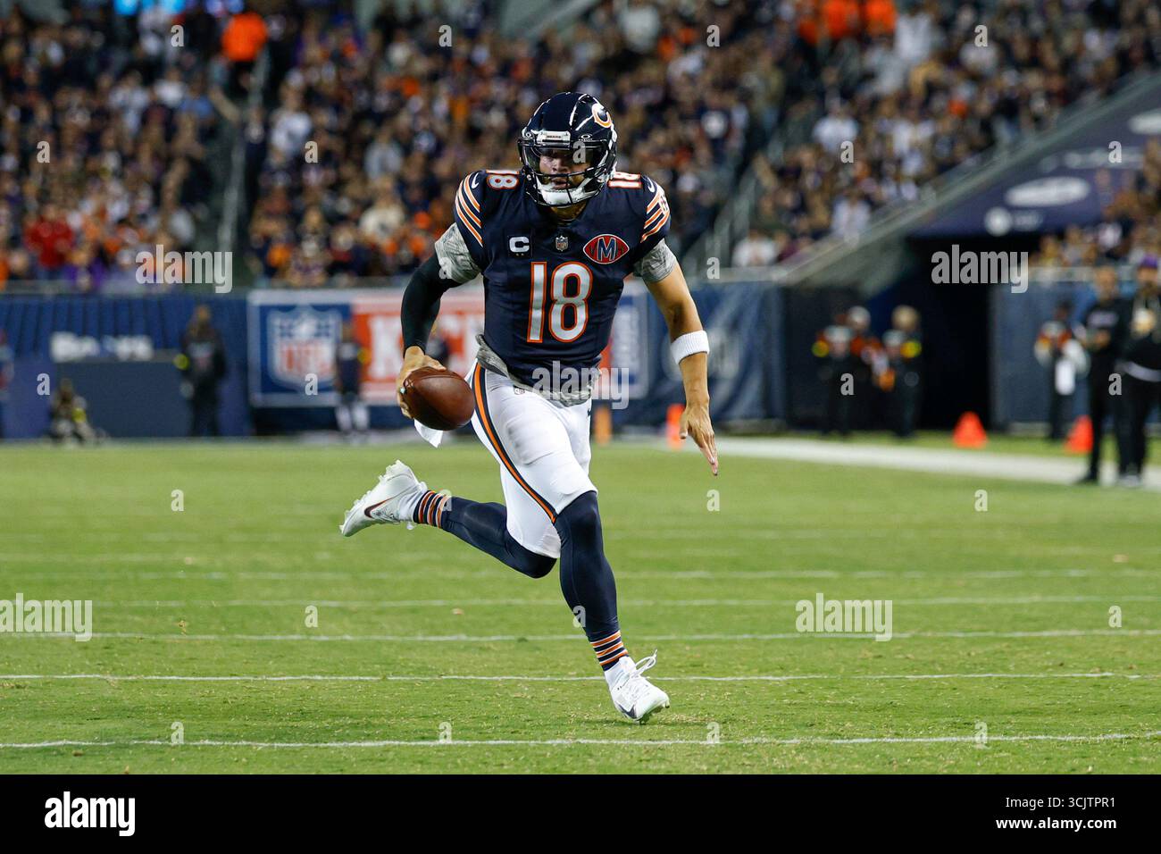 Chicago Bears quarterback Caleb Williams (18) runs to score a touchdown ...
