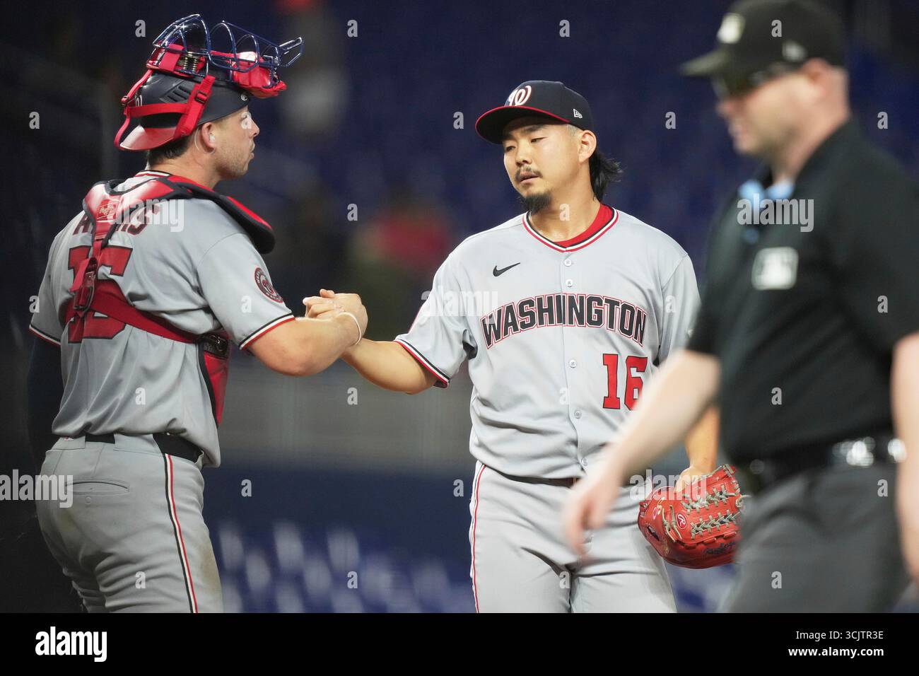 Washington Nationals catcher Riley Adams (15) shakes hands with relief ...