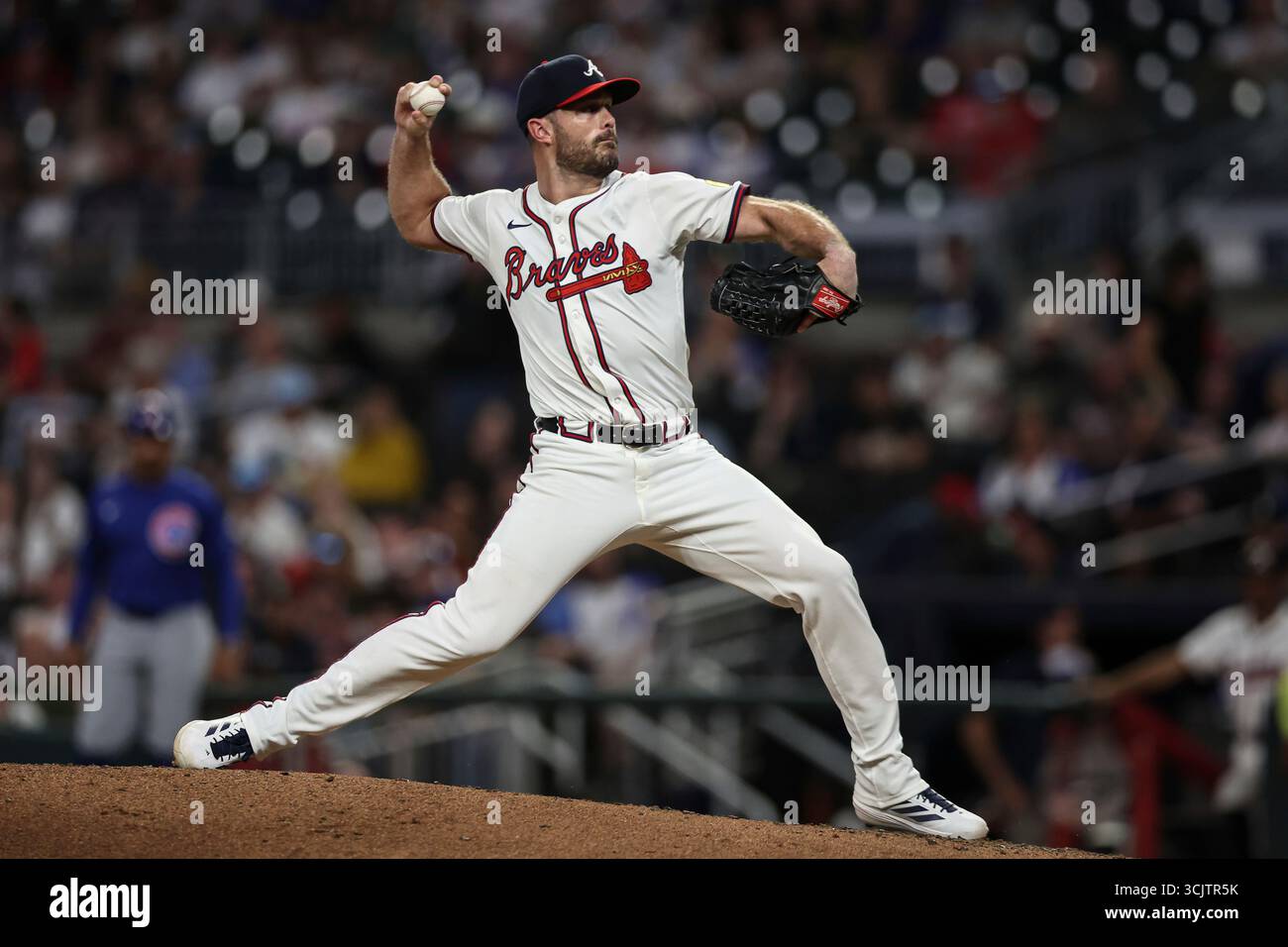 Atlanta Braves pitcher Tyler Kinley delivers in the eighth inning of a ...