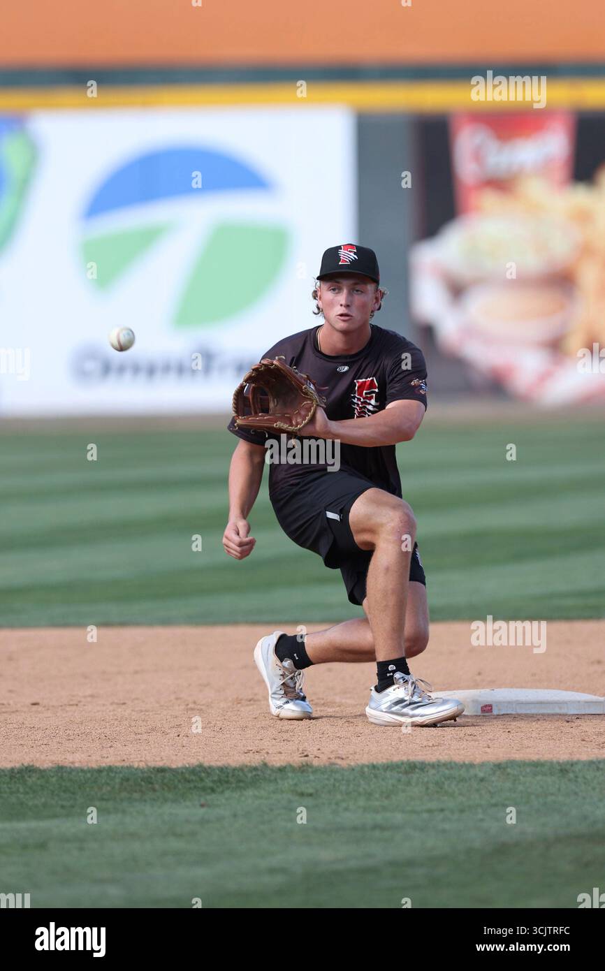 Ethan Holliday (18) of the Fresno Grizzlies takes infield practice ...