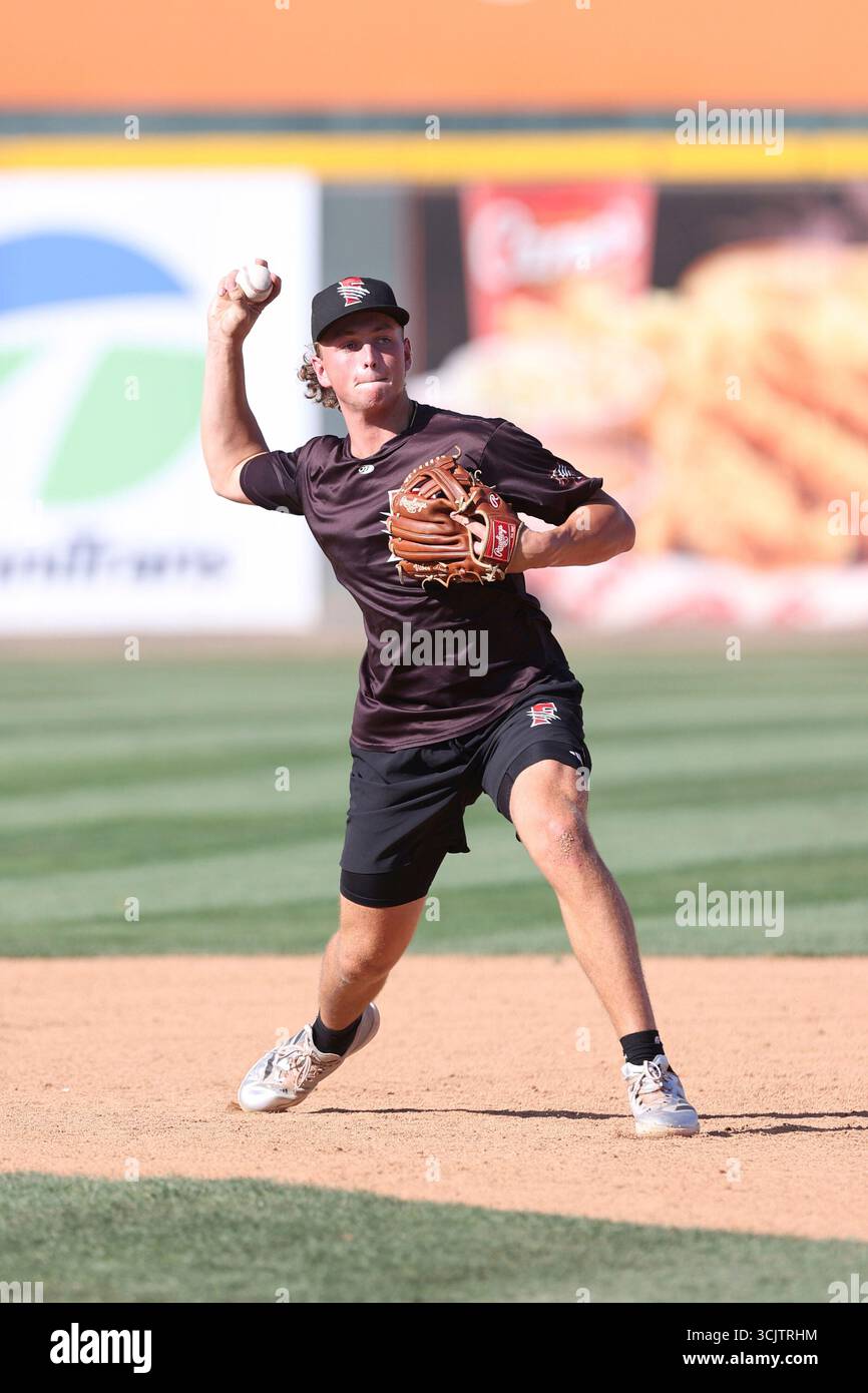 Ethan Holliday (18) of the Fresno Grizzlies takes infield practice ...