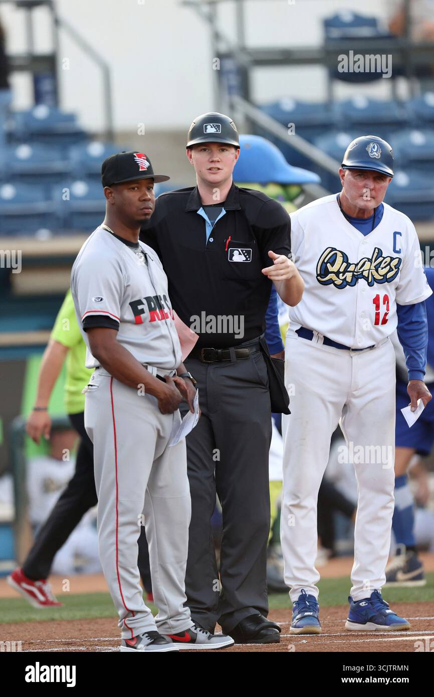 Umpire Reid Hoover with Fresno Grizzlies manager Cesar Galvez and ...