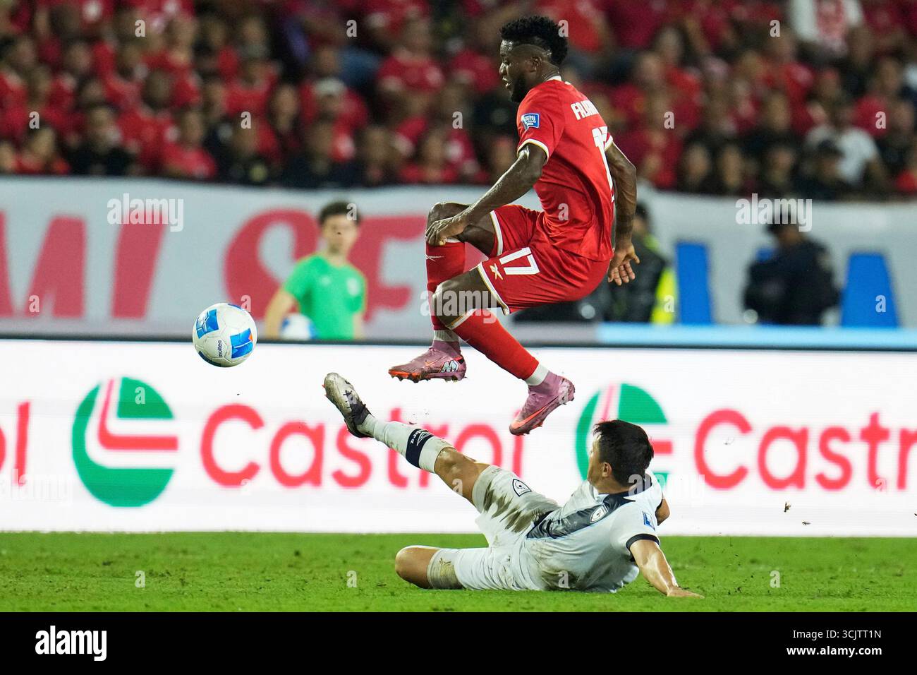 Panama's Jose Fajardo, top, jumps over Guatemala's Jose Rosales during ...