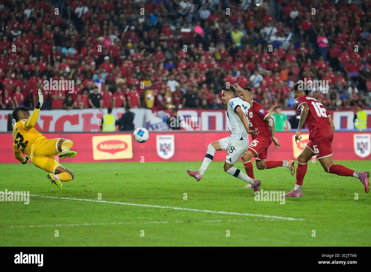 Guatemala's Oscar Santis, third from right, scores his side's opening ...