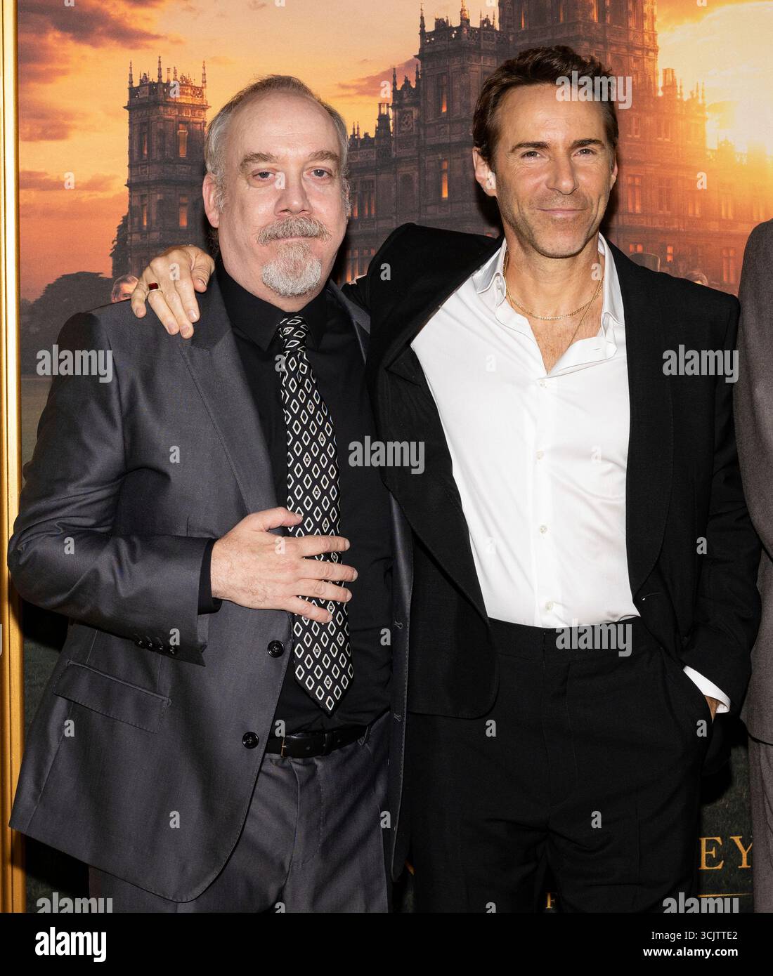 Paul Giamatti, left, and Alessandro Nivola attend the premiere of "Downton Abbey: The Grand ...
