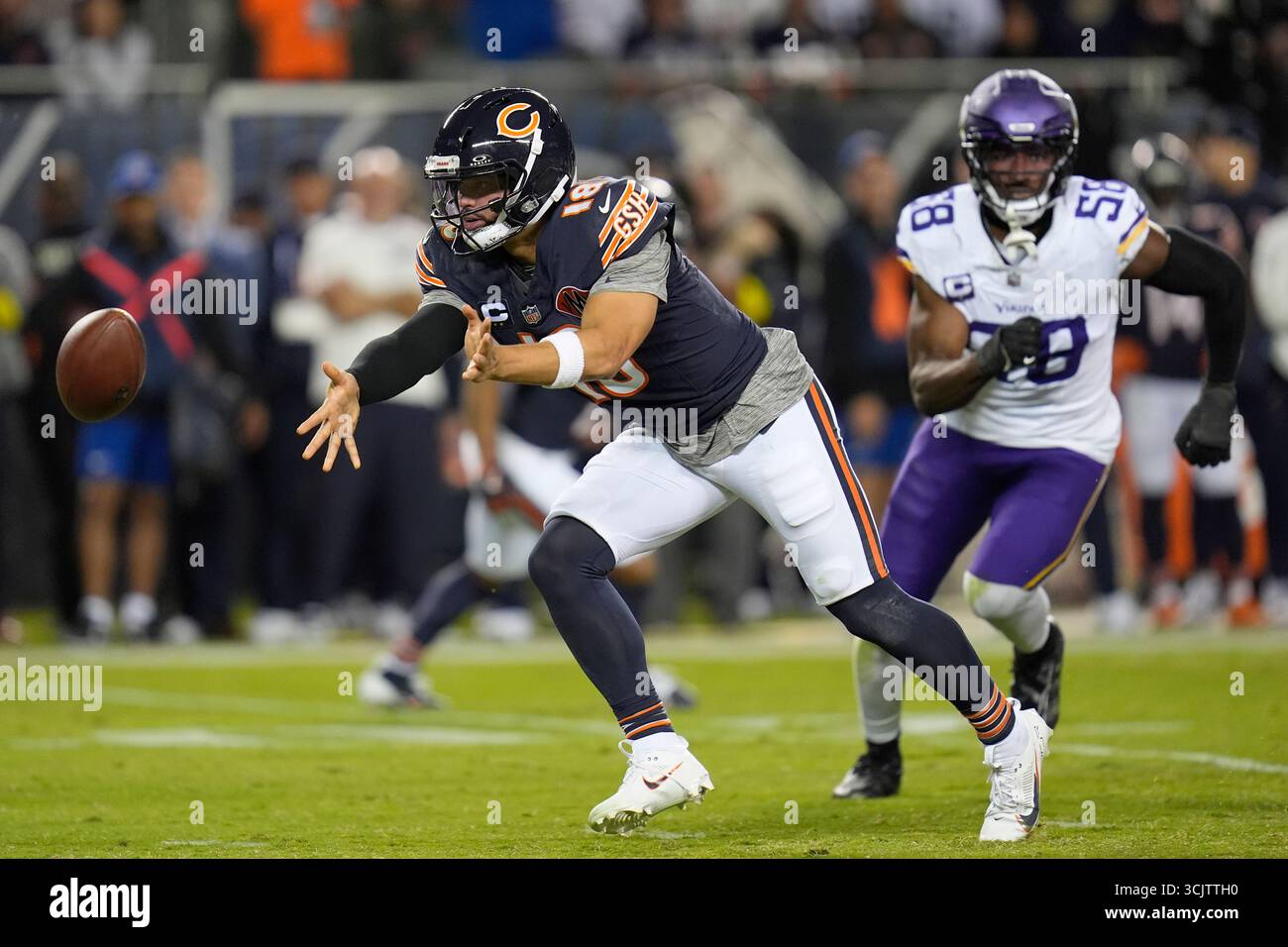 Chicago Bears quarterback Caleb Williams tosses the ball as Minnesota ...