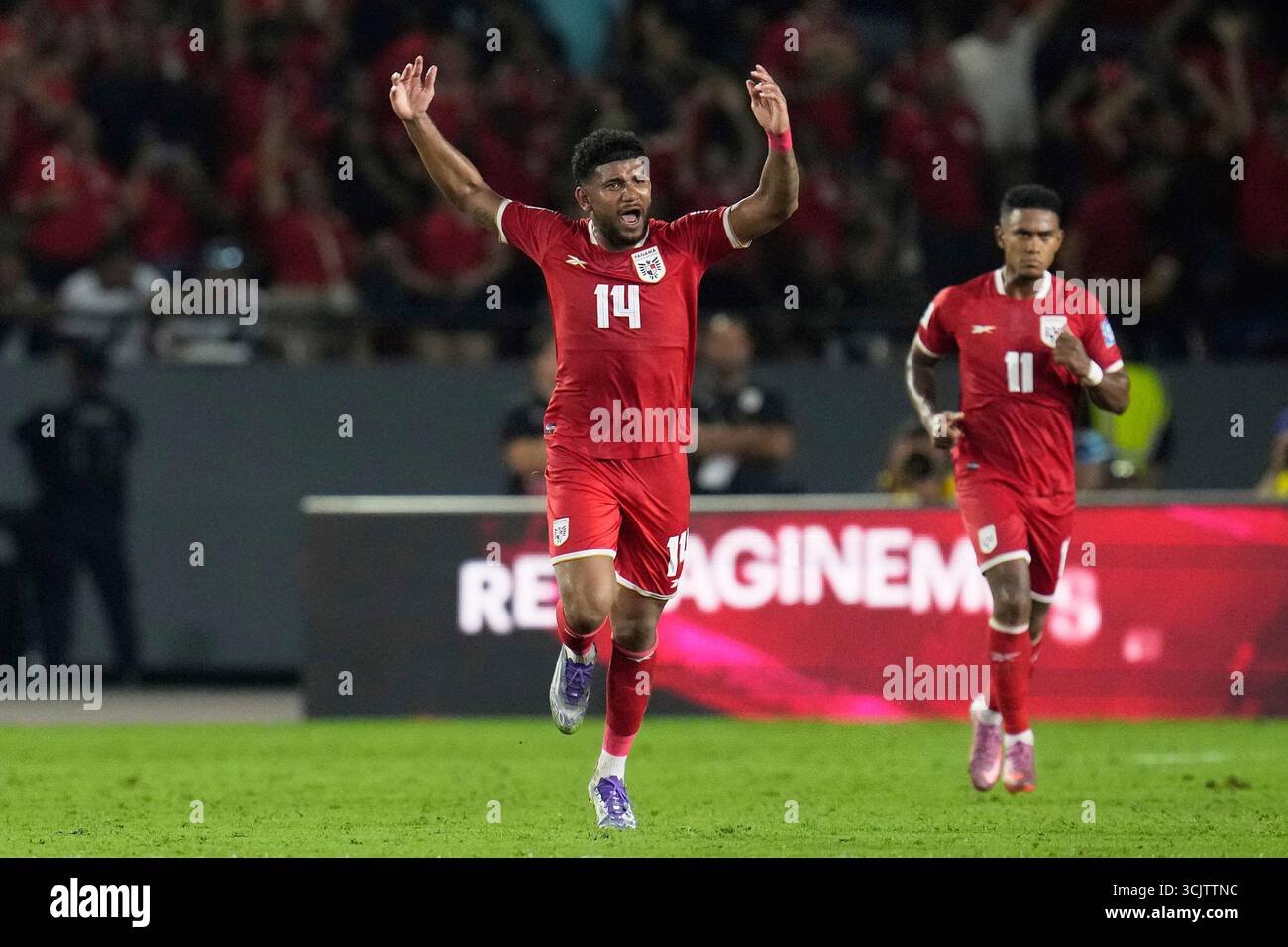 Panama's Carlos Harvey, left, celebrates scoring his side's first goal ...