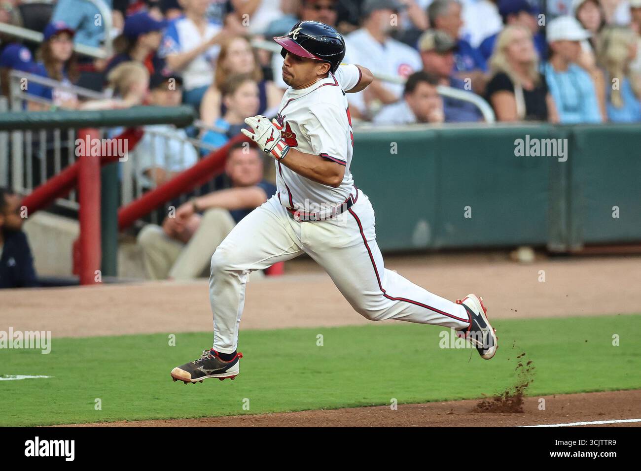 Atlanta Braves' Drake Baldwin rounds third base before scoring a run in ...