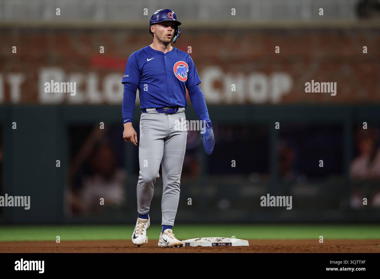 Chicago Cubs' Nico Hoerner stands on second base after hitting a double ...