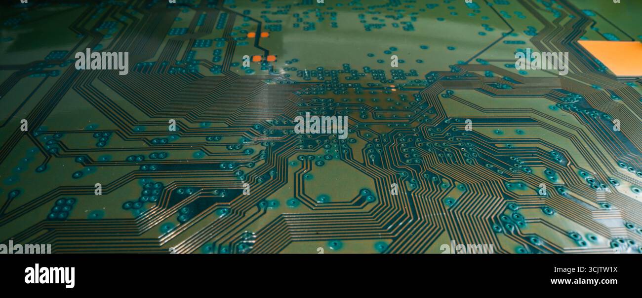 Technology hardware background. High tech electronic circuit board ...