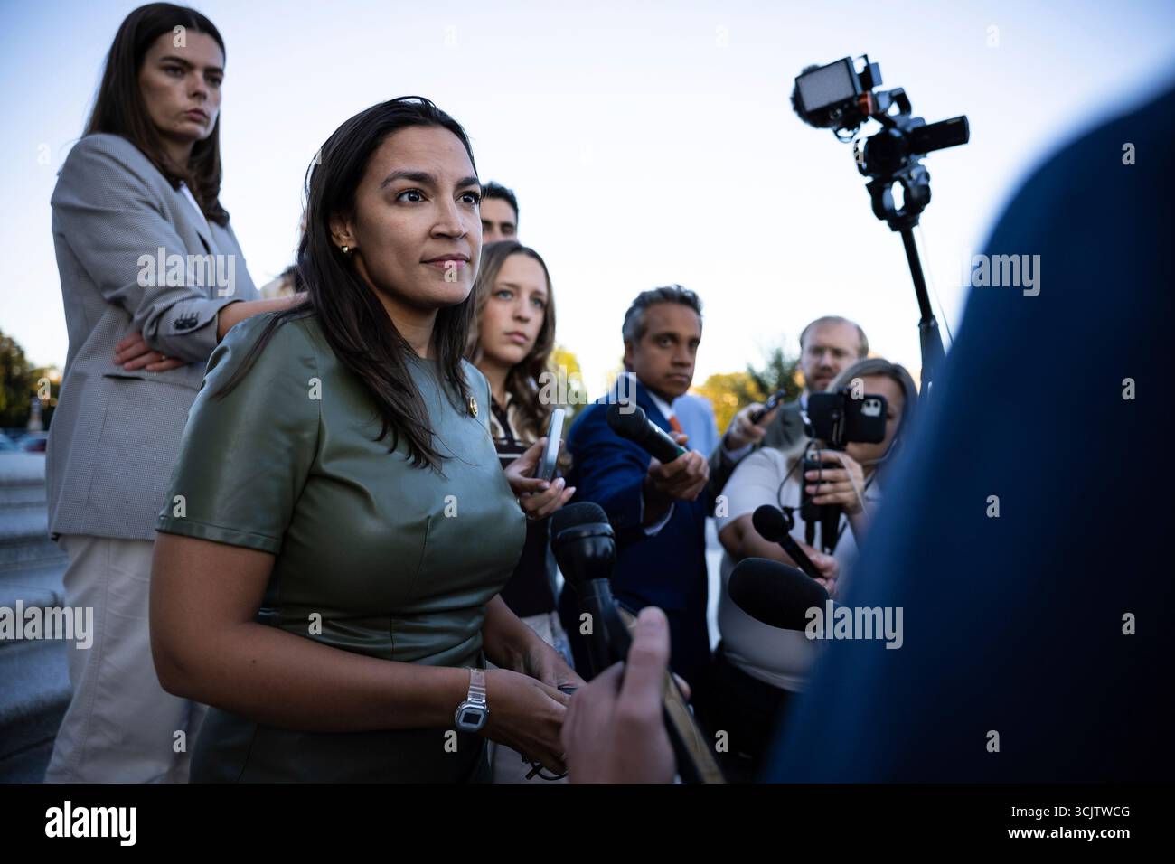 Rep. Alexandria Ocasio-Cortez (D-N.Y.) speaks with reporters outside ...
