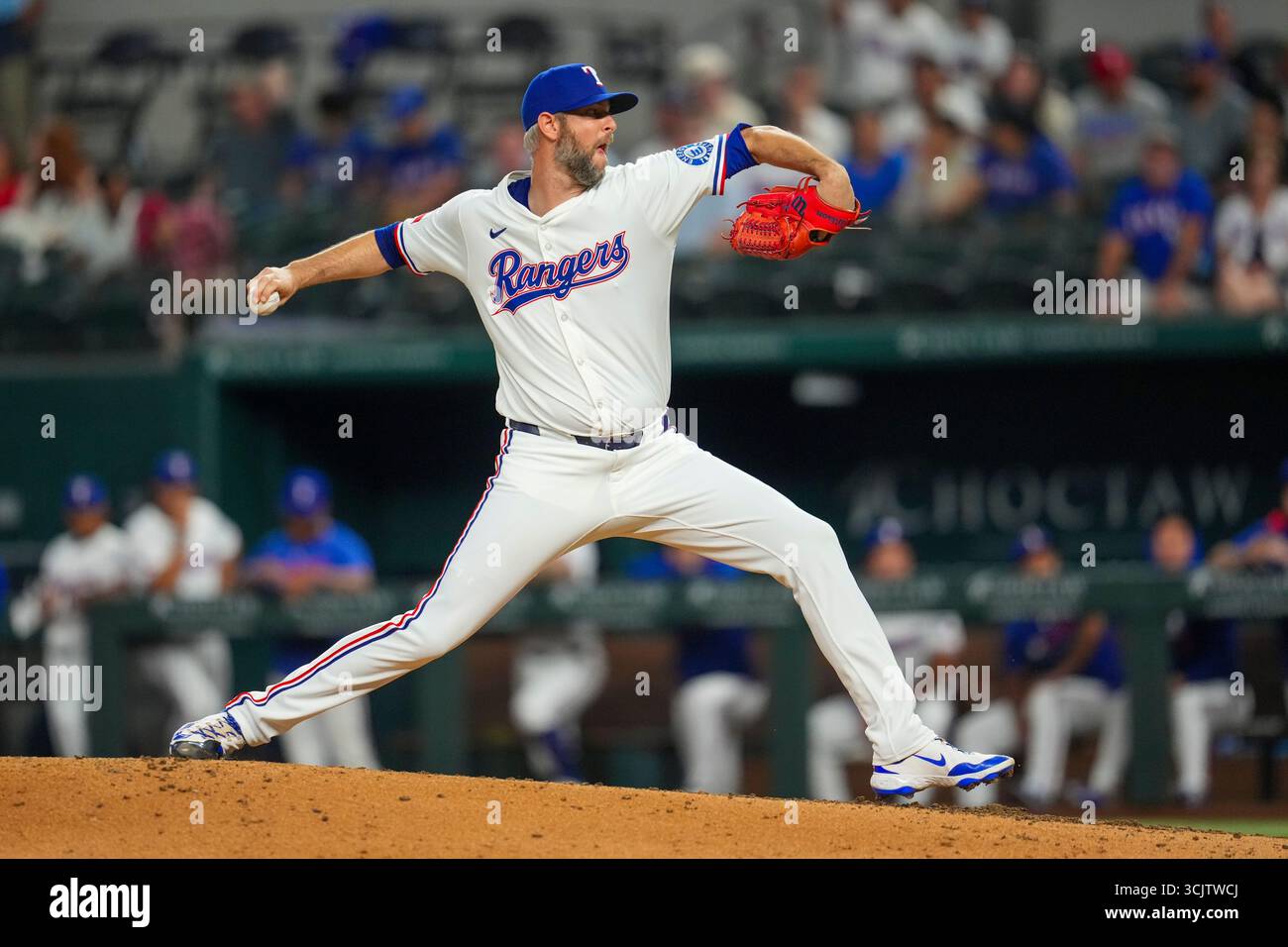 Texas Rangers pitcher Chris Martin throws against the Milwaukee Brewers ...