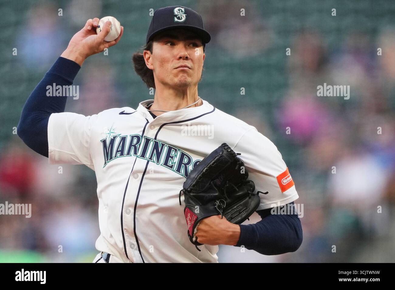Seattle Mariners starting pitcher Bryan Woo throws against the St ...