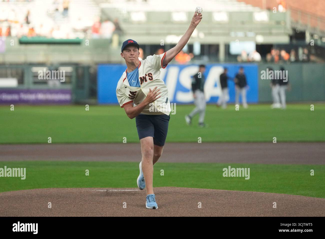 Golfer Niall Shiels Donegan throws a ceremonial first pitch before a ...