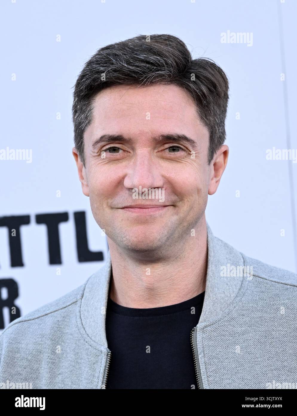Topher Grace arriving to the “One Battle After Another” premiere held ...