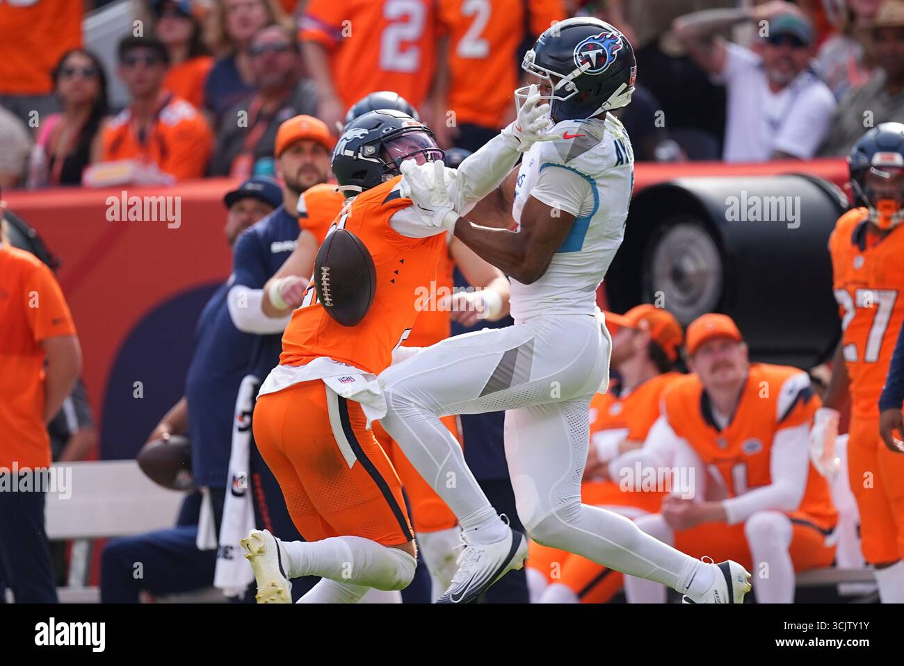 Denver Broncos cornerback Riley Moss (21) breaks up a pass for ...